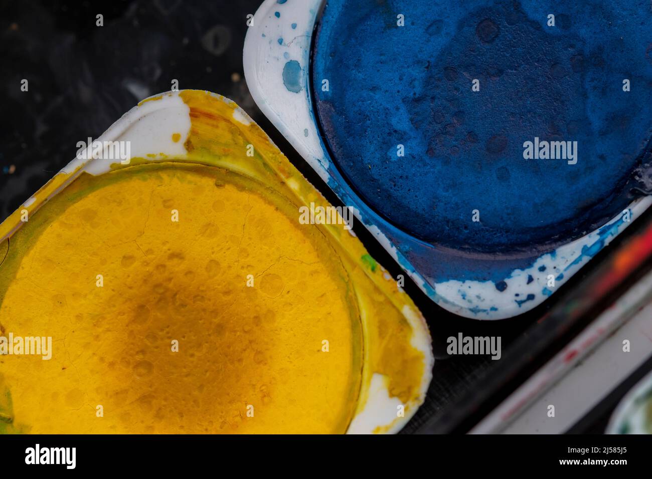 Close-up macro shot of beautiful vibrant watercolour pallete with ...