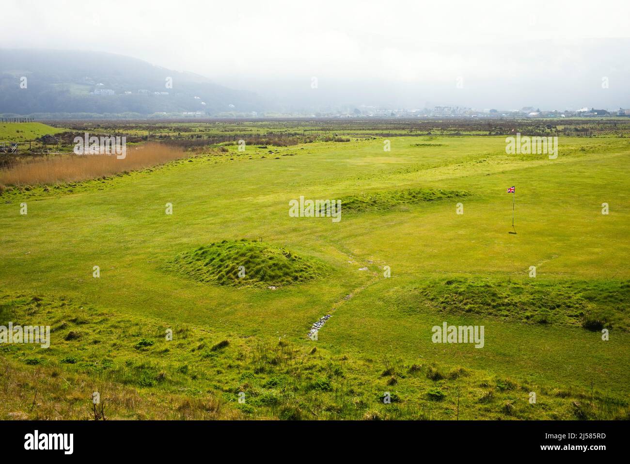 A Union Jack marks a hole on a green at Fairbourne Golf Club, North ...