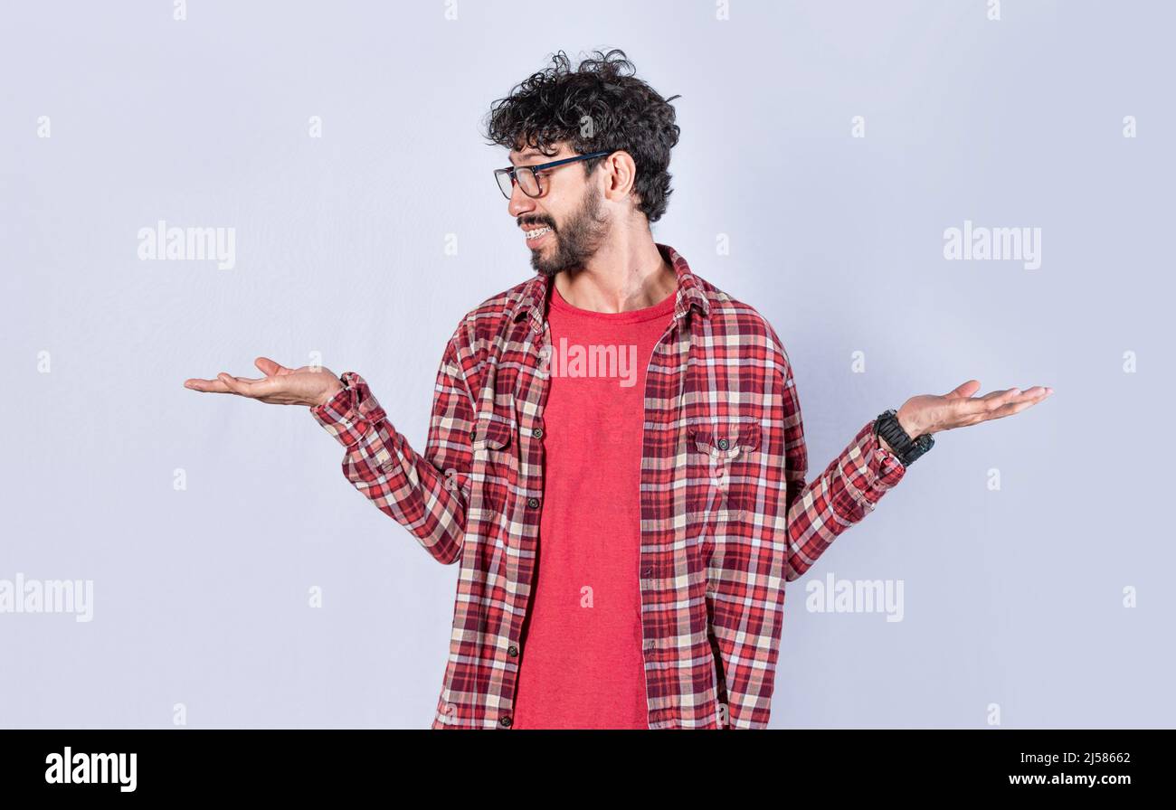 Man balancing the palms of his hands, man comparing with the palms of ...