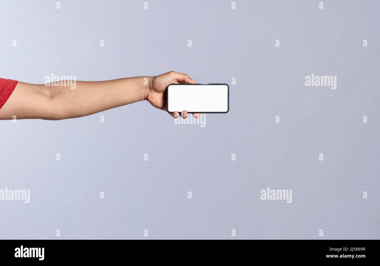 Hand with cell phone isolated, hand showing cell phone isolated, one ...