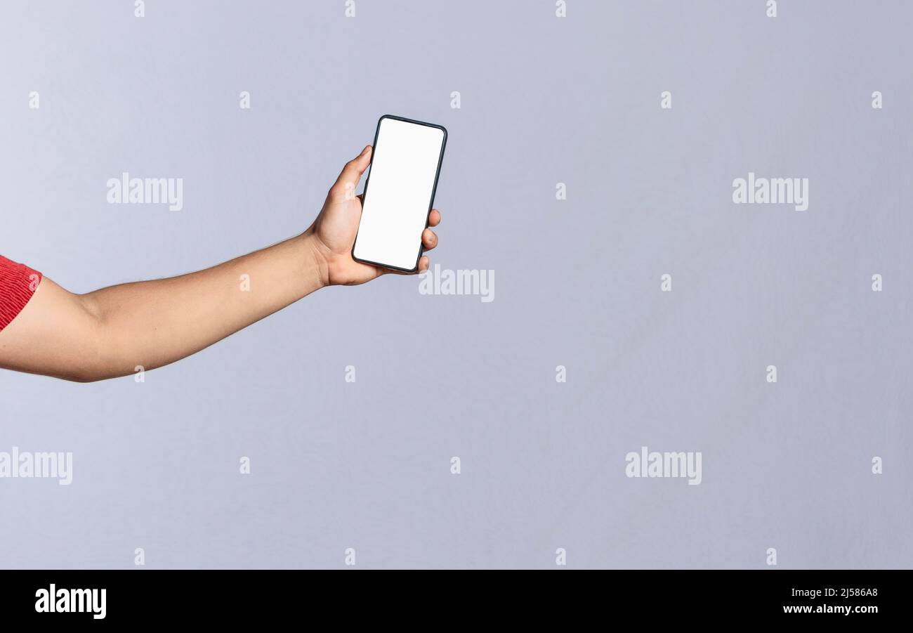 Hand with cell phone isolated, hand showing cell phone isolated, one ...
