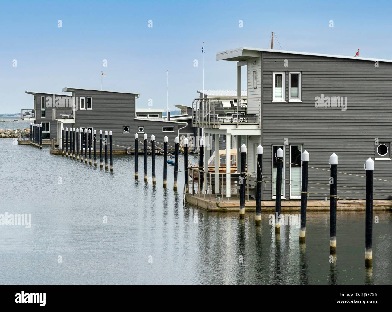 Pile dwellings as holiday homes with boat mooring, Tiny House, marina ...