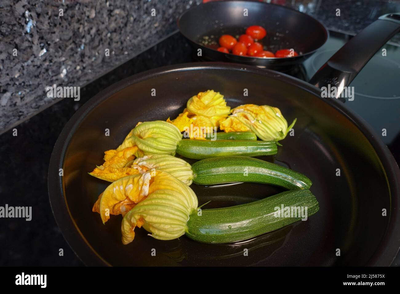 Southern German cuisine, preparation stuffed courgette flowers, garden ...