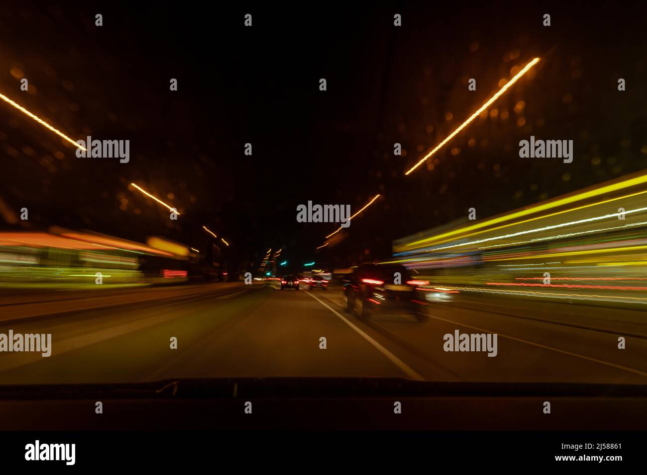 When driving fast, pulling lights from the car and buildings when ...