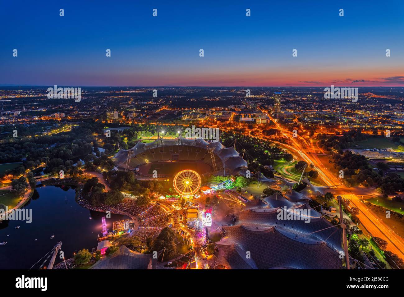 Munich from above at night with bright colours at sunset. View from the ...