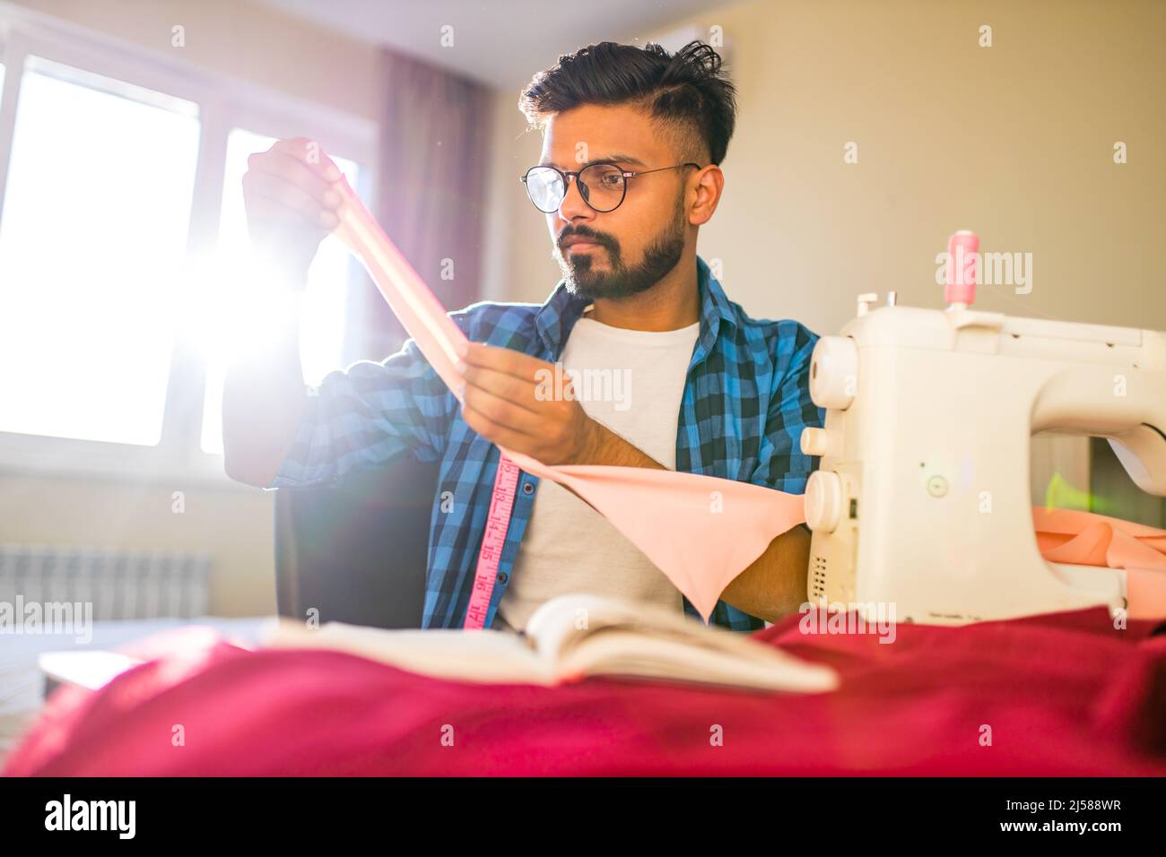 Indian tailoring hi-res stock photography and images - Alamy
