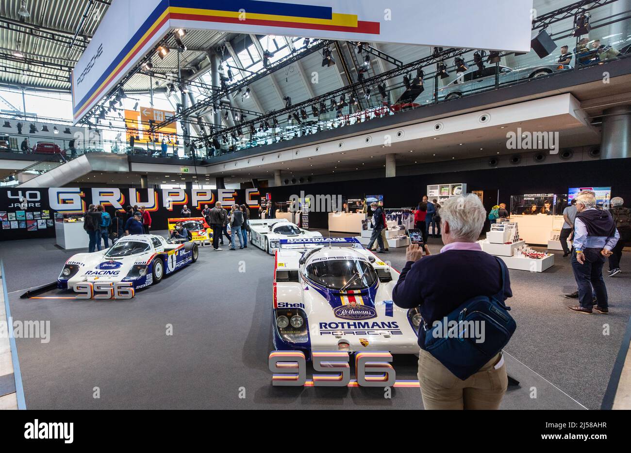 Stuttgart, Germany. 21st Apr, 2022. Visitors look at "956" Porsche ...