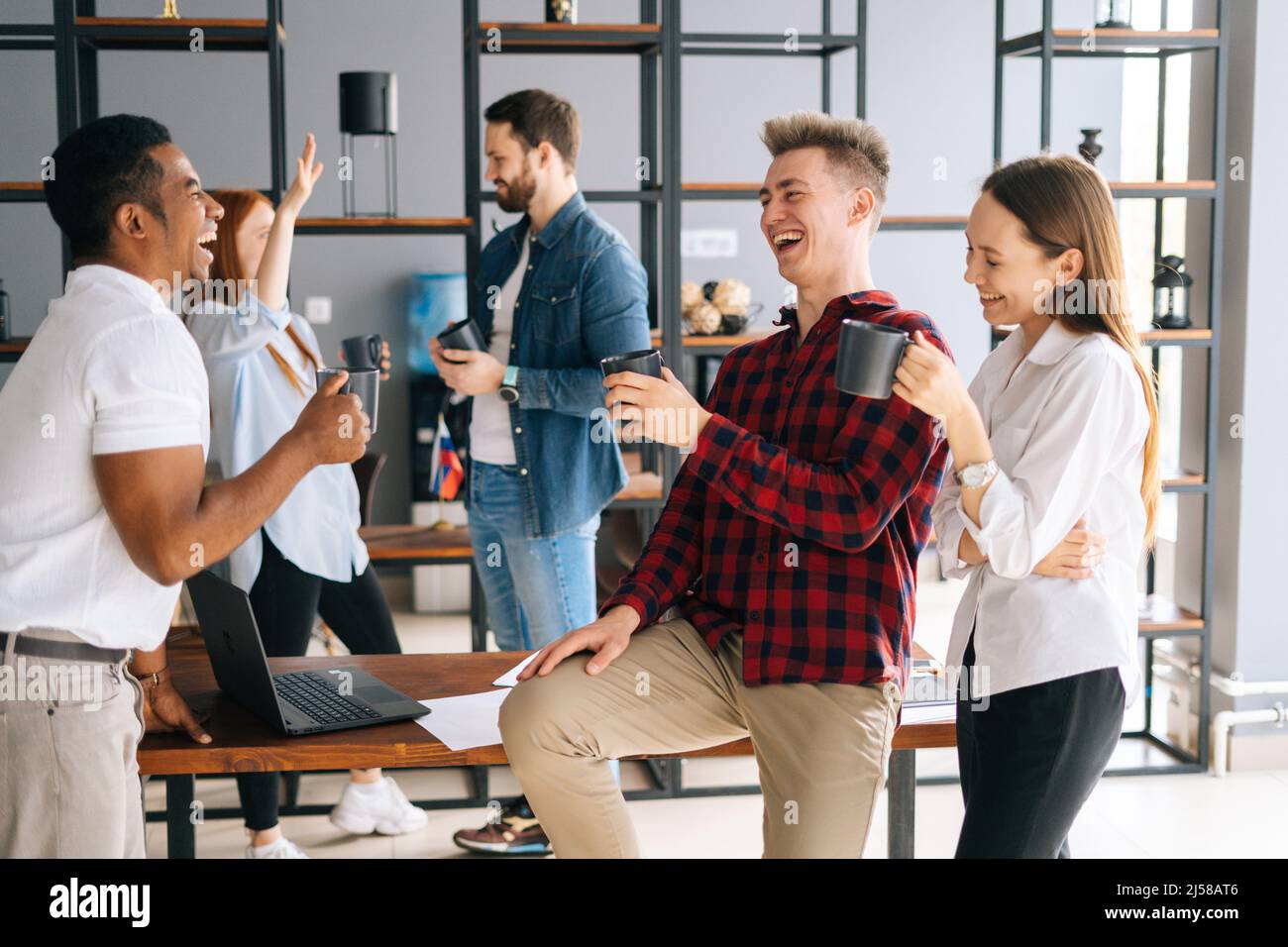 Hipster business team chatting laughing hi-res stock photography and ...