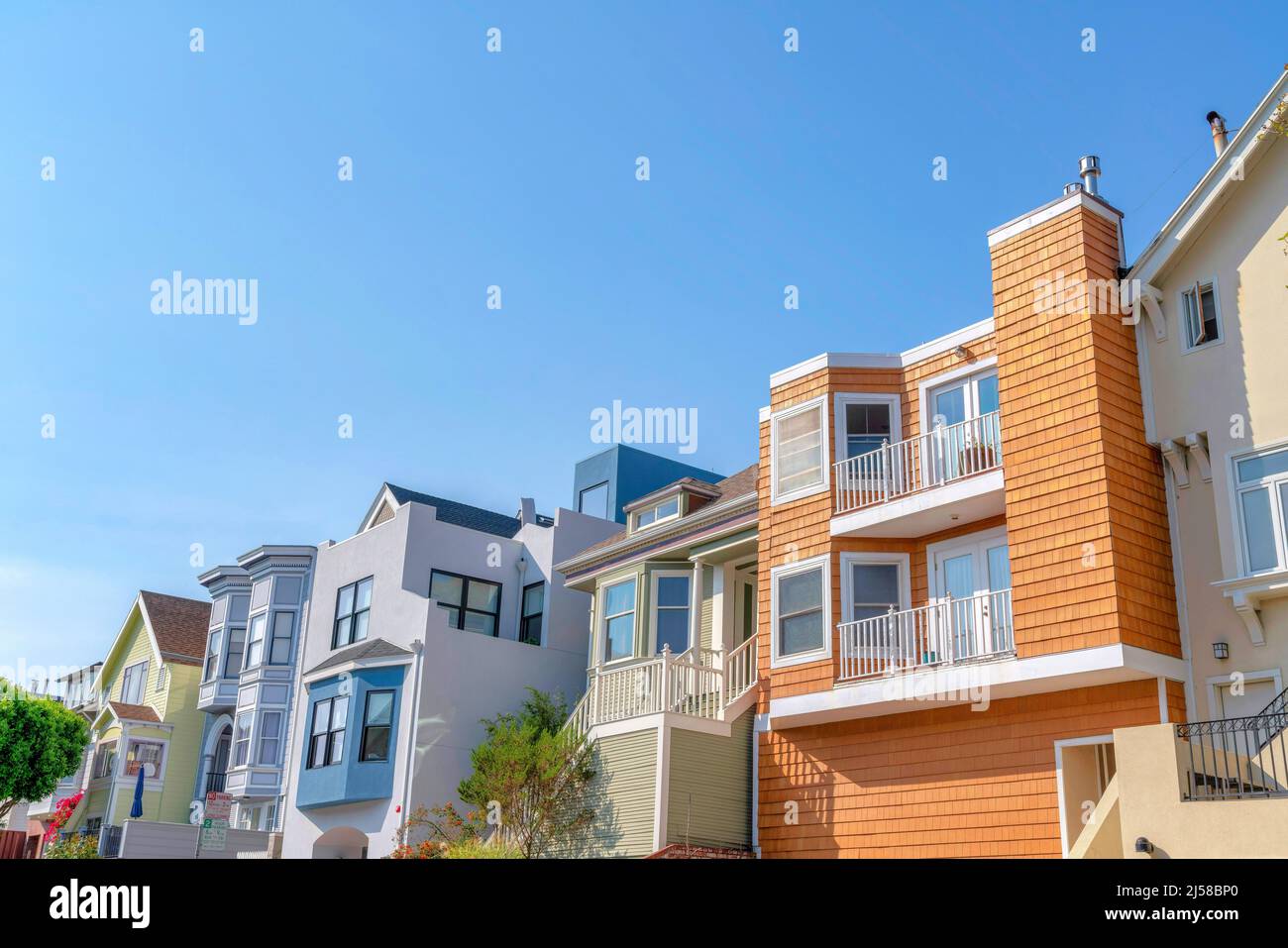 Complex houses in the suburbs of San Francisco, California. Facade of ...