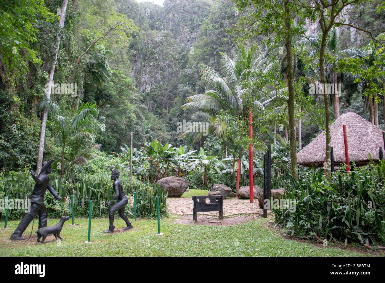 Statue of a runaway slave and master, outside of cave where slaves used ...