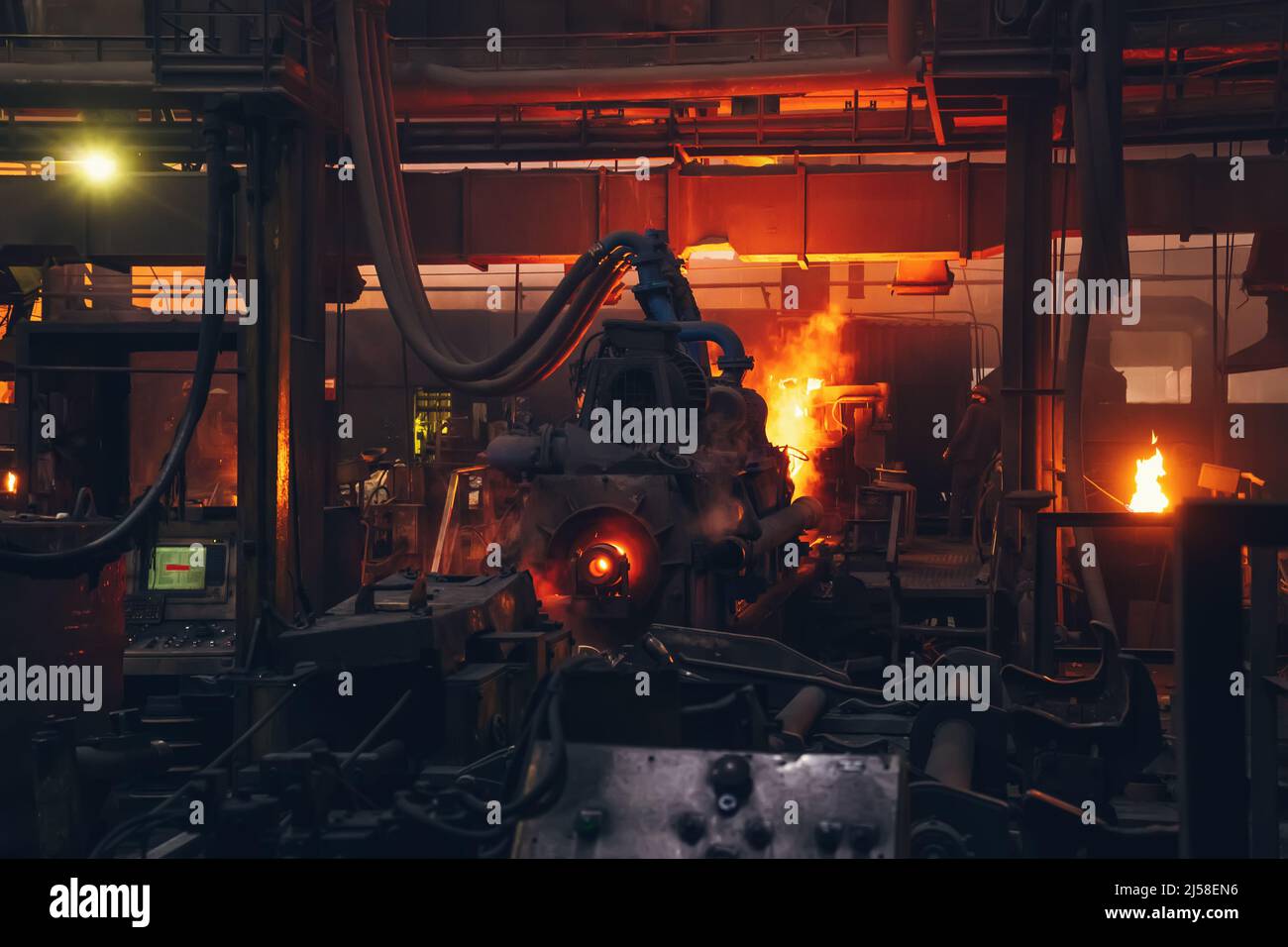 Metal casting in metallurgical plant or factory. Process of melting and ...