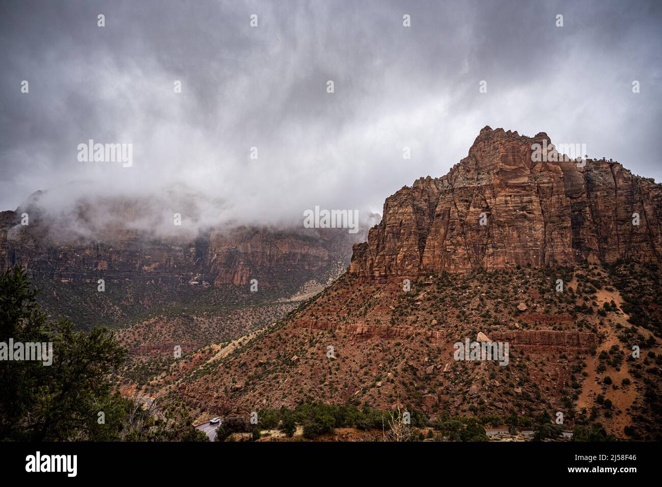 Low Hanging Cloud Passes Behind Mount Spry in Zion National Park Stock ...
