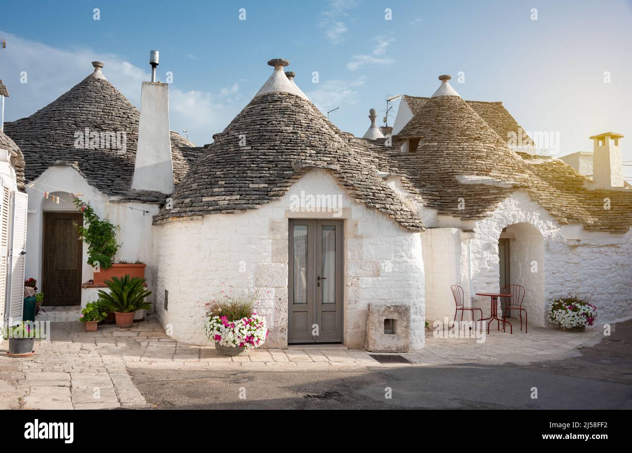 Alberobello town in Italy, famous for its traditional trullo houses ...