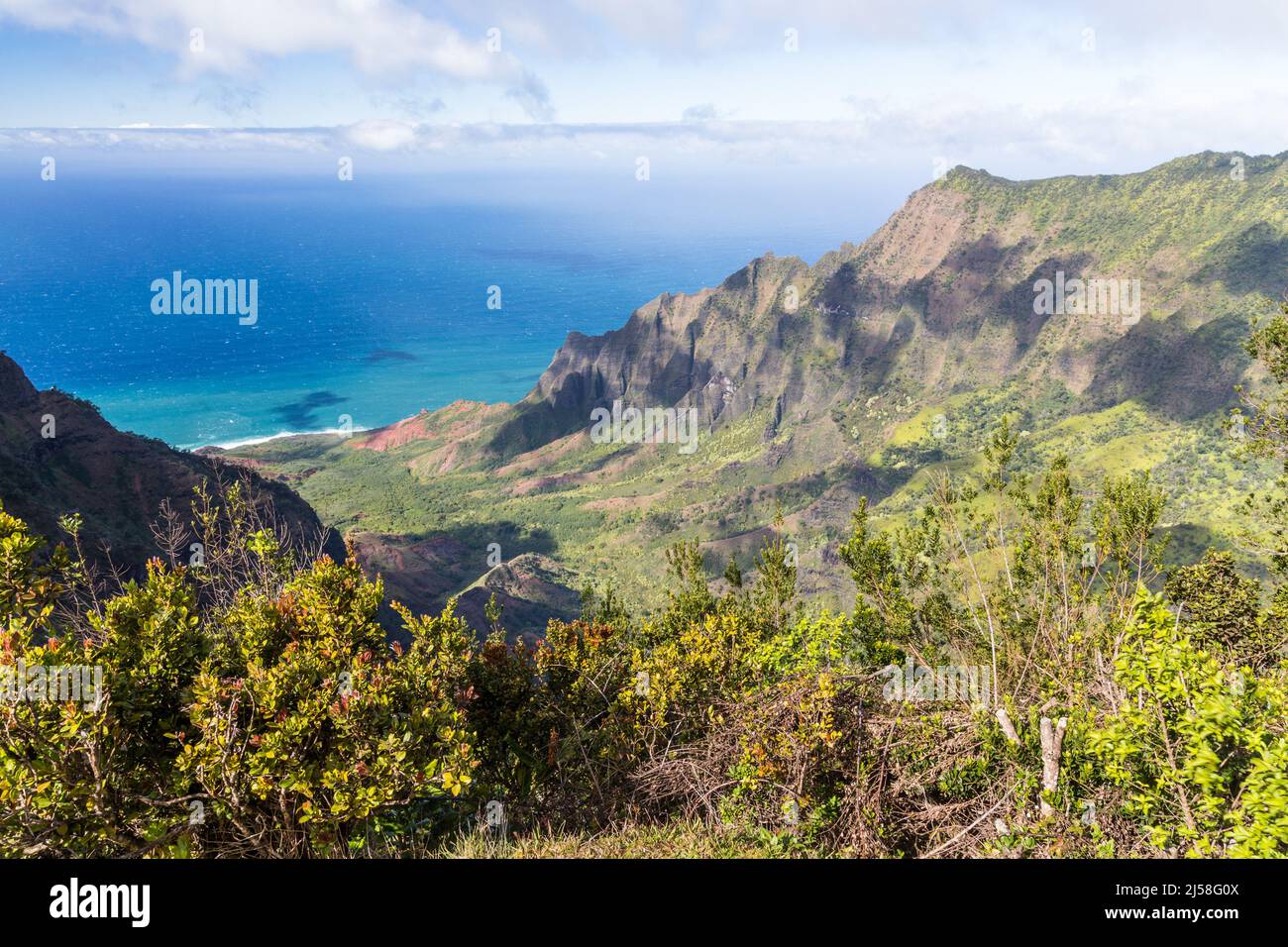 The Kalalau Valley between sheer cliffs in the Na Pali Coast State Park ...