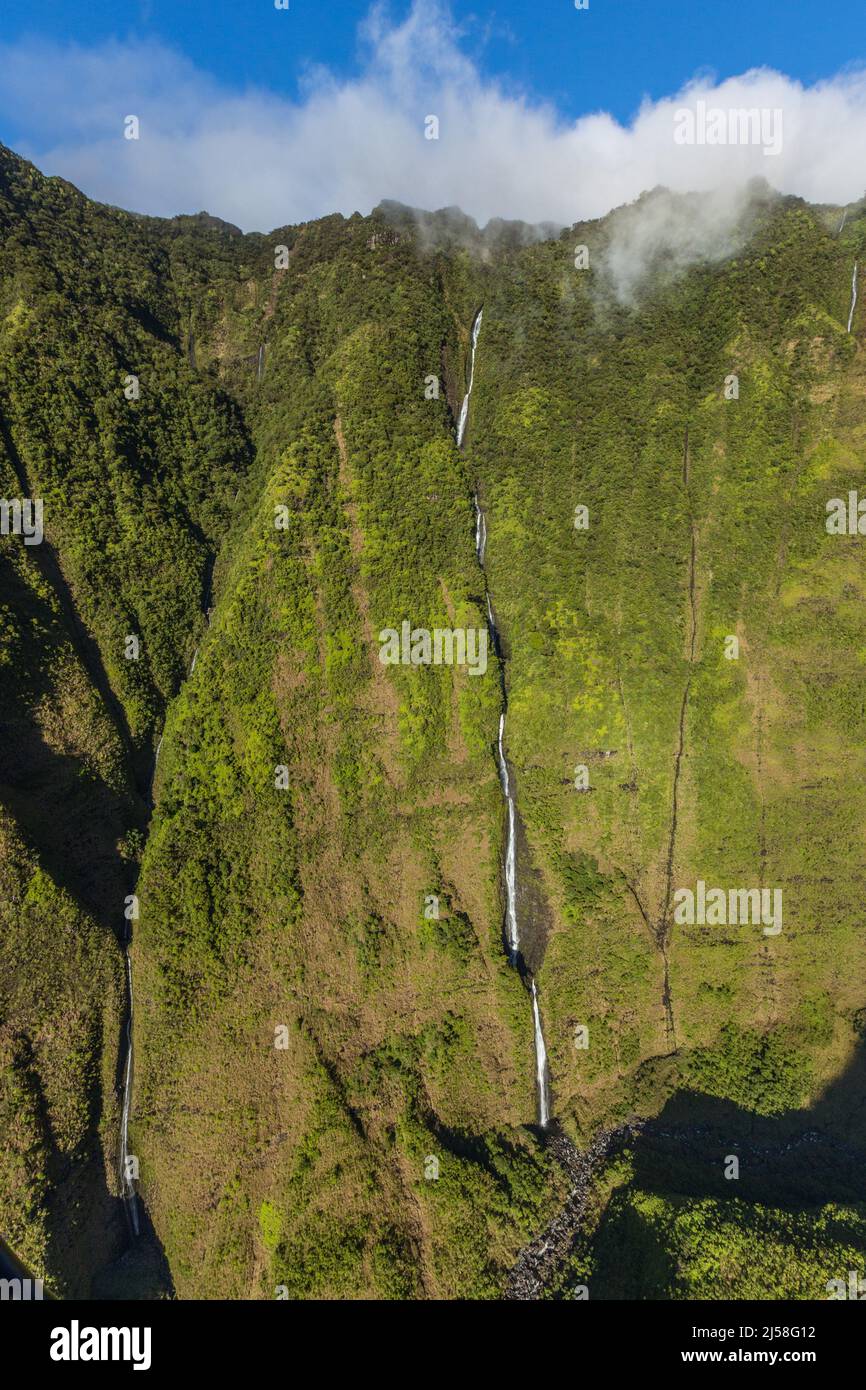 Waterfalls plunge more than 2,000 feet from the Alakai Plateau into the ...