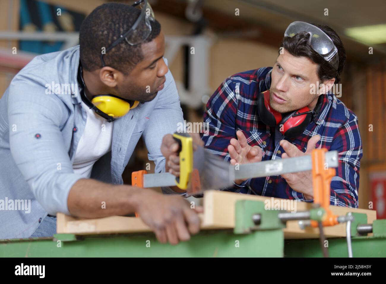Two young workmen hi-res stock photography and images - Alamy