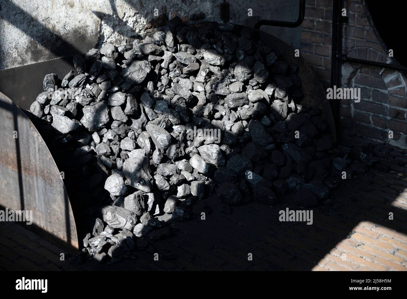 Old-fashioned, non-environmental heating fuel, black rock coal for use ...