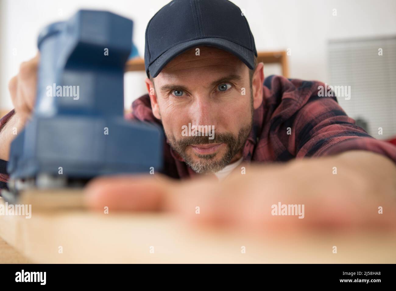 Close up male hands sanding hi-res stock photography and images - Alamy