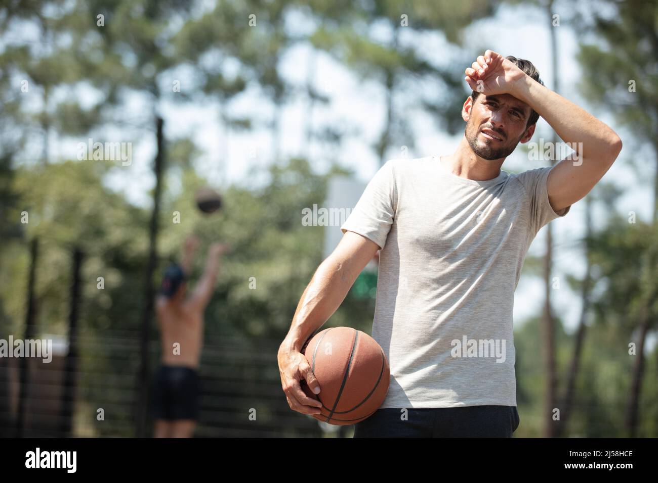 Man hand dribbling ball hi-res stock photography and images - Alamy
