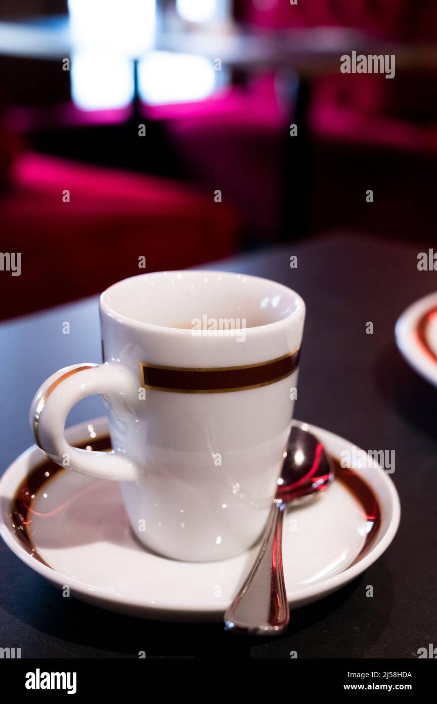 Small cup of black espresso coffee served in traditional cafe in Vienna ...