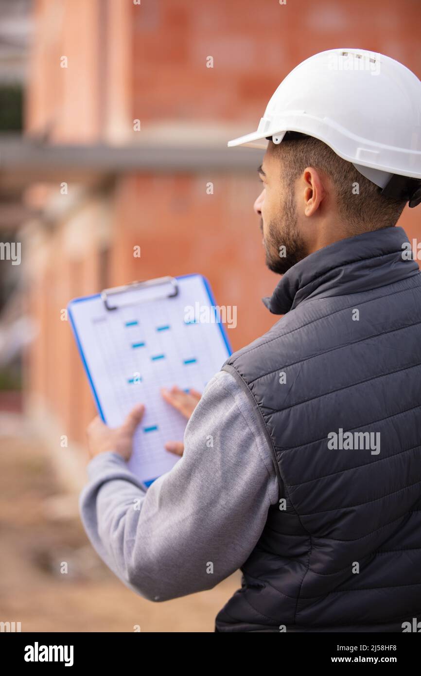 Inspector checking inspecting building hi-res stock photography and ...