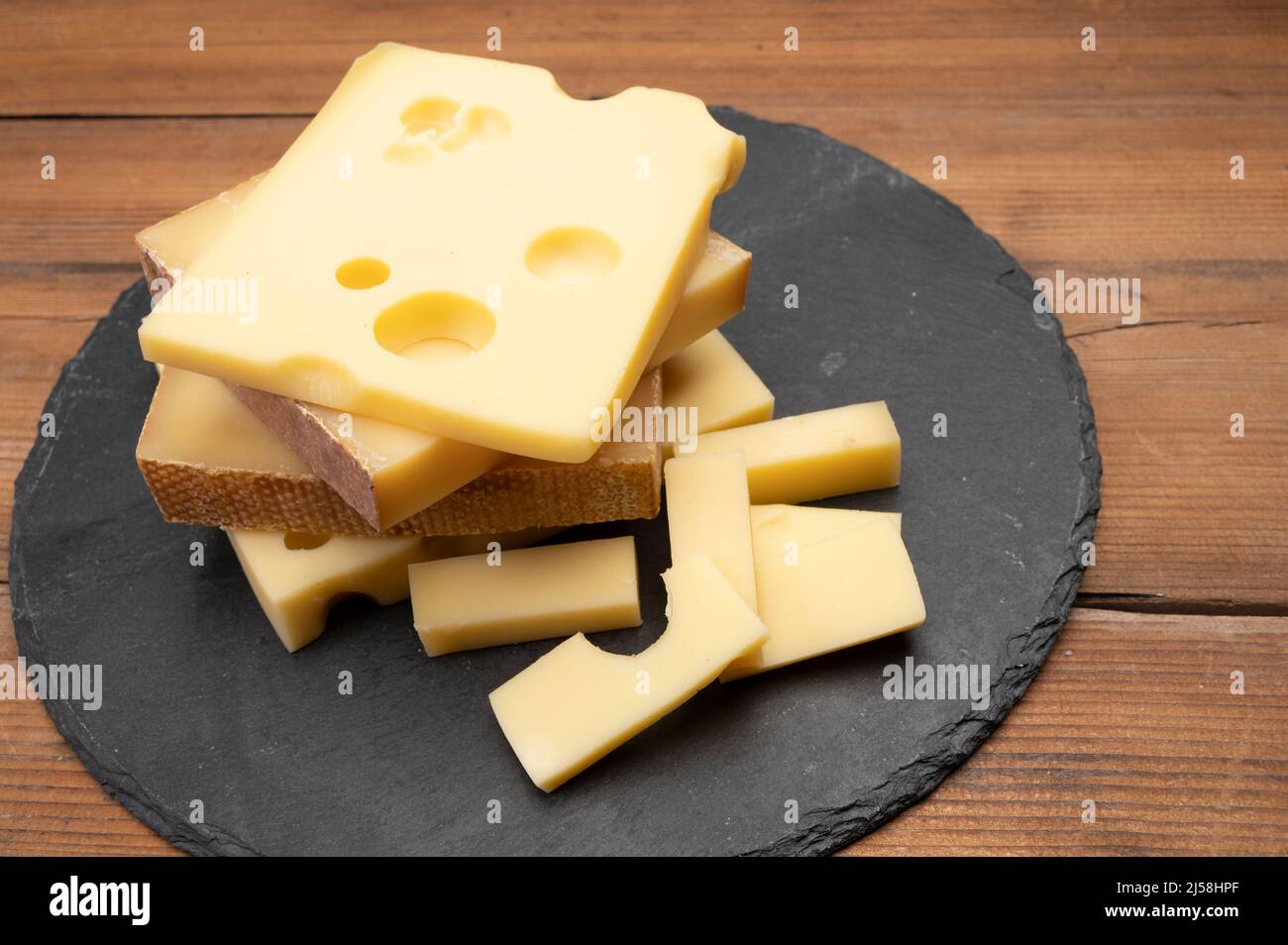 Swiss cheese collection, emmentaler with holes, gruyere, appenzeller ...
