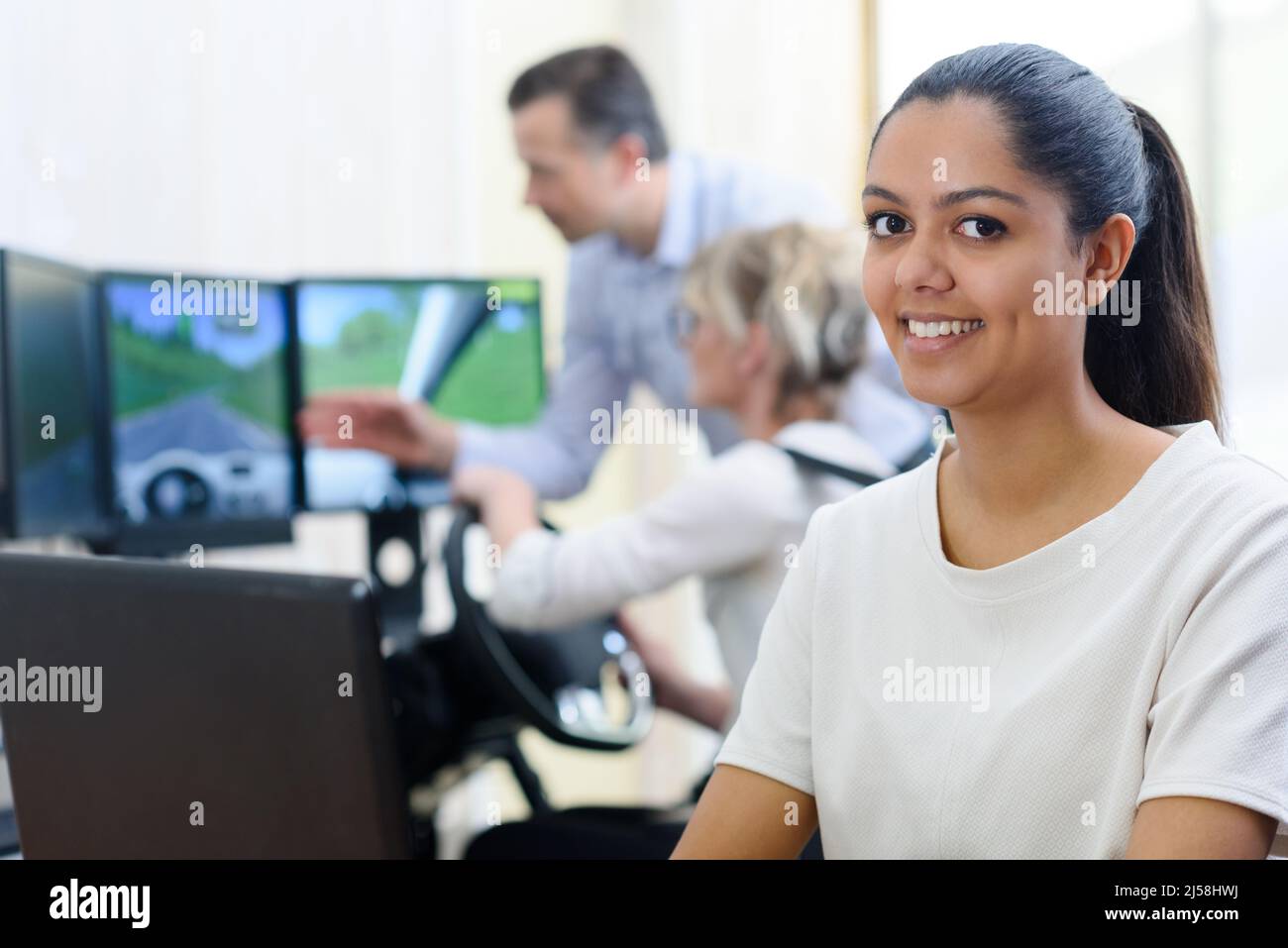 female student driver looking in the camera Stock Photo - Alamy