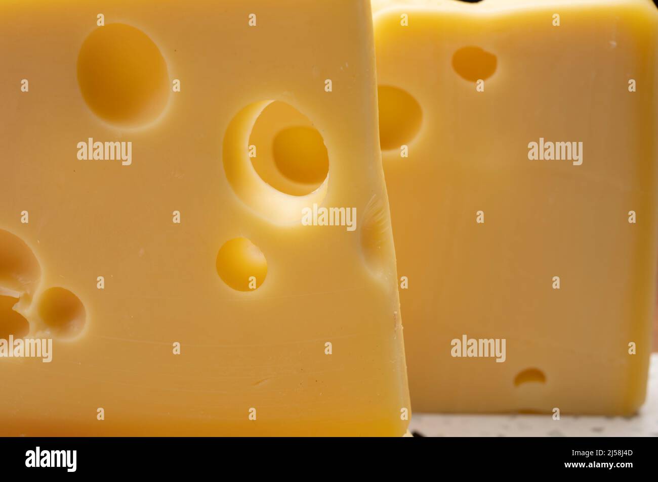 Swiss cheese collection, yellow emmentaler or emmental cheese with ...