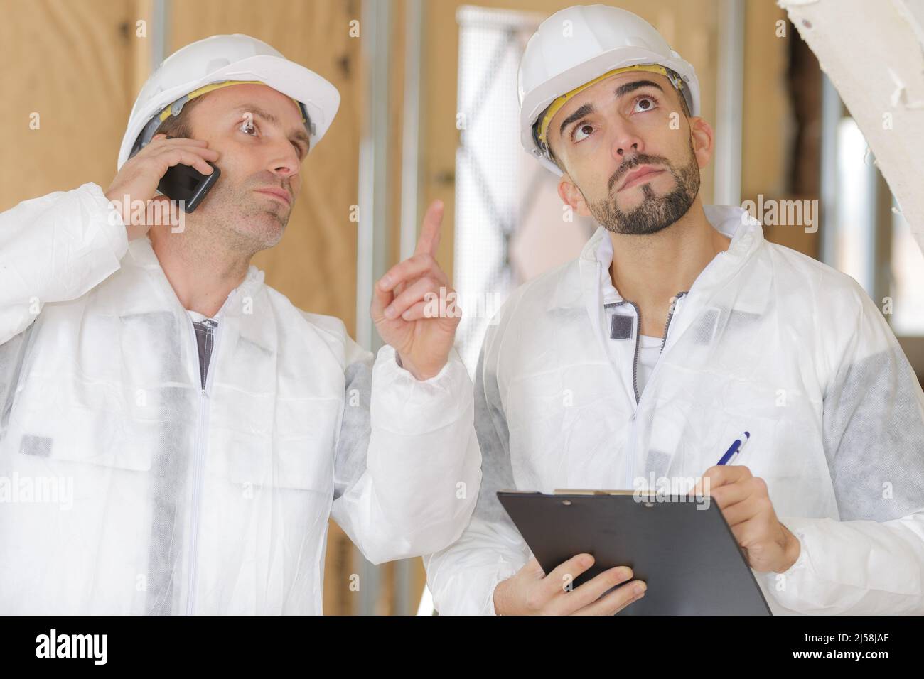 Pointing to the ceiling hi-res stock photography and images - Alamy