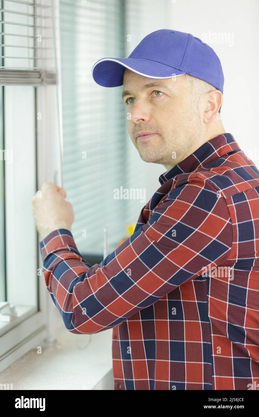 Install blinds hi-res stock photography and images - Alamy