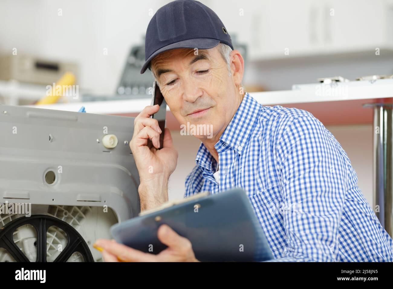 a handsome senior technician at work Stock Photo - Alamy