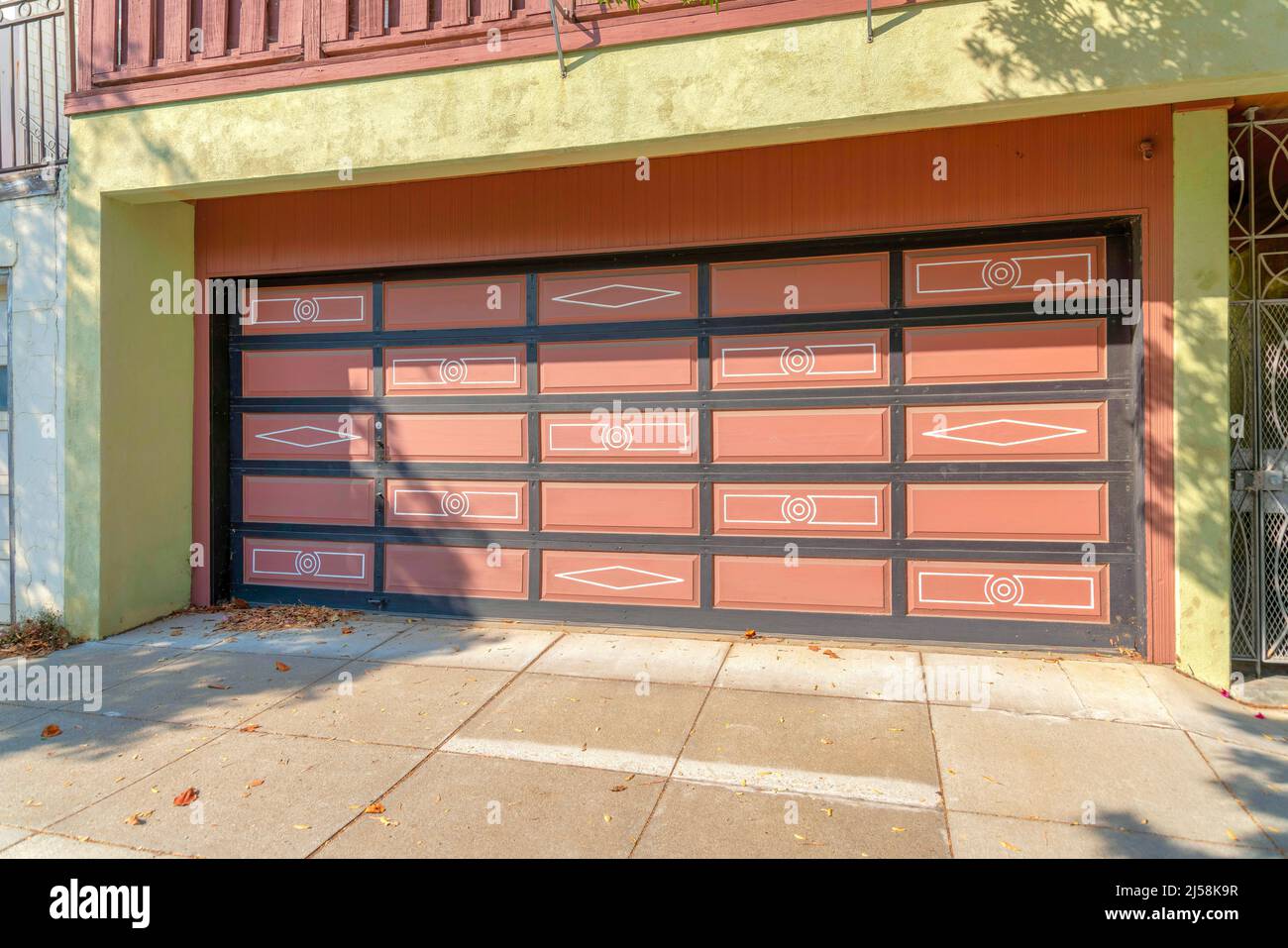Garage exterior with peach exterior and black grids at San Francisco ...