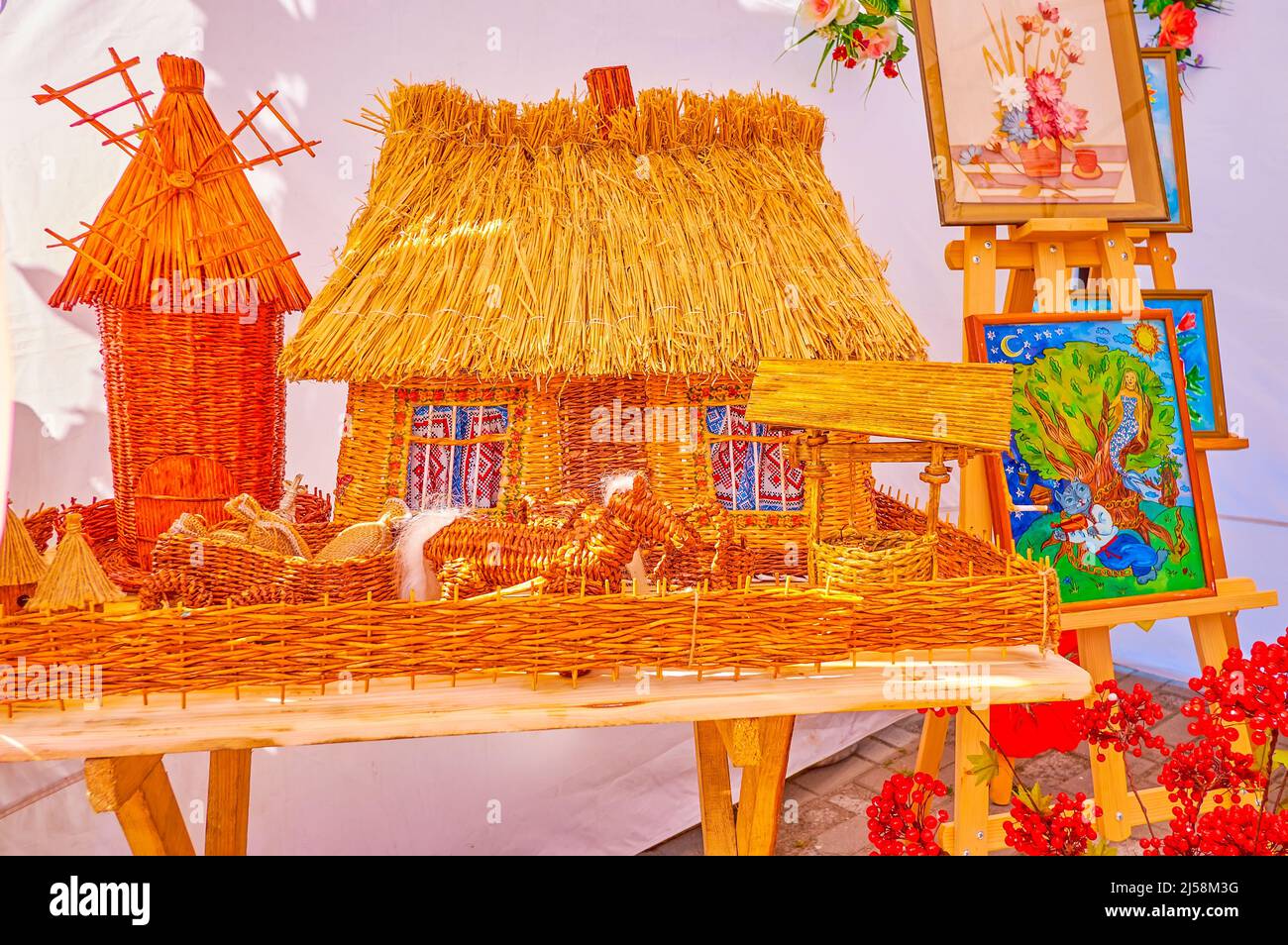 The craftmen's stall with knitted straw house and courtyard ...
