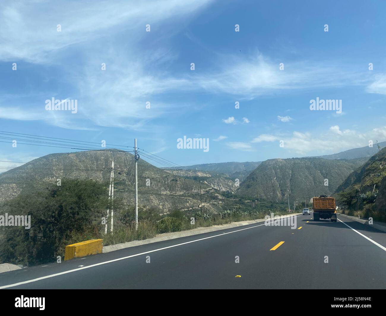 Driving on highway through Andes mountains outside Quito, Ecuador Stock ...