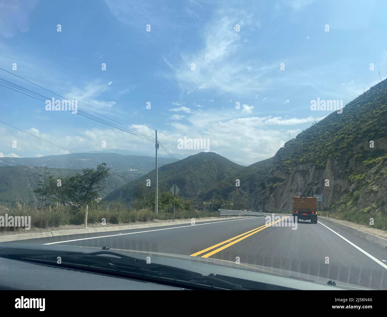 Driving on highway through Andes mountains outside Quito, Ecuador Stock ...