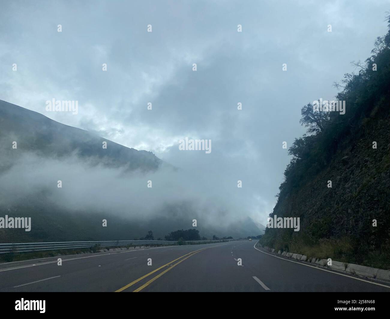 Driving on highway through Andes mountains outside Quito, Ecuador Stock ...