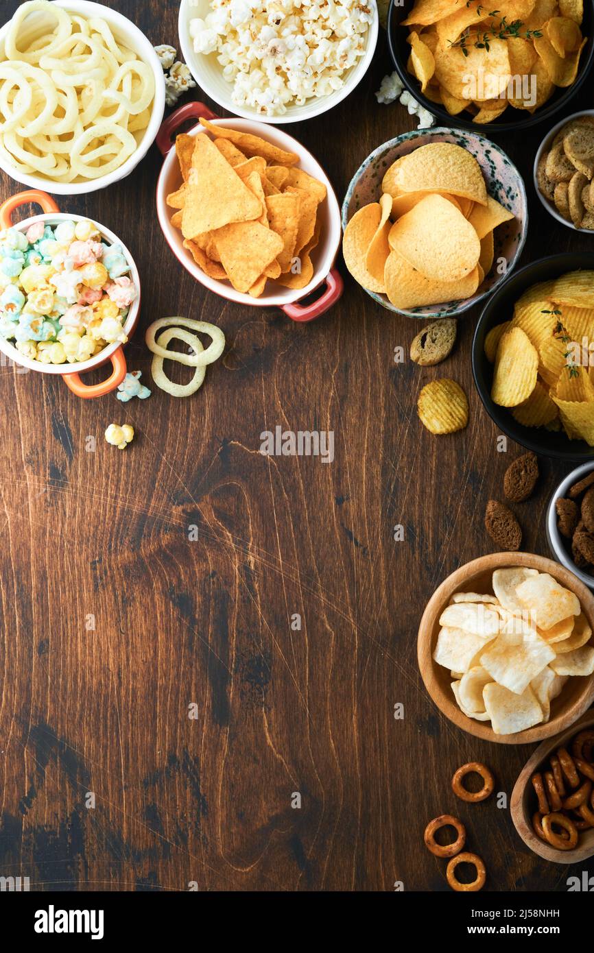 Unhealthy food or snacks. All classic potato snacks with peanuts ...