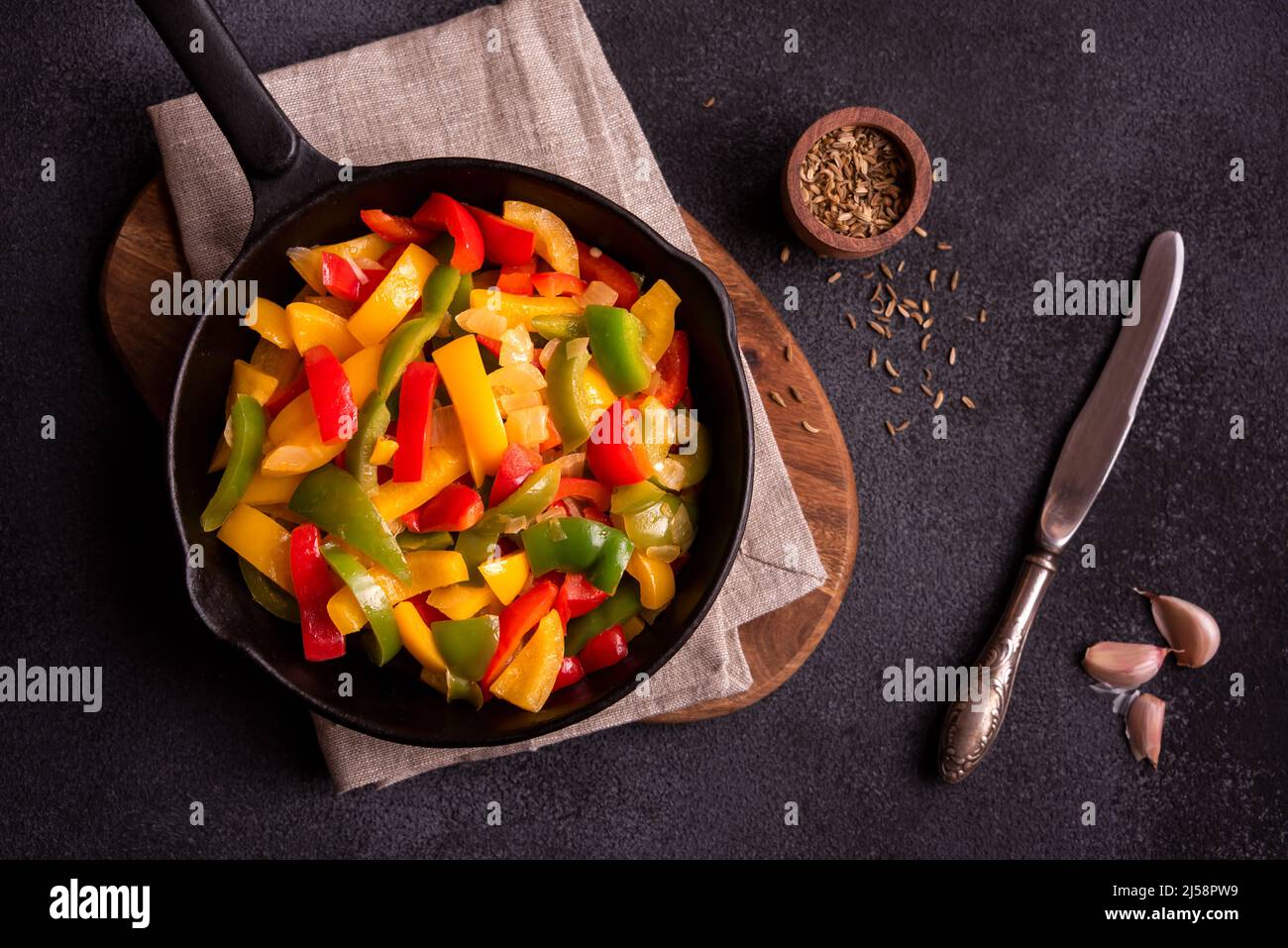 Cooked bell peppers of different colors, healthy vegetarian dish Stock ...