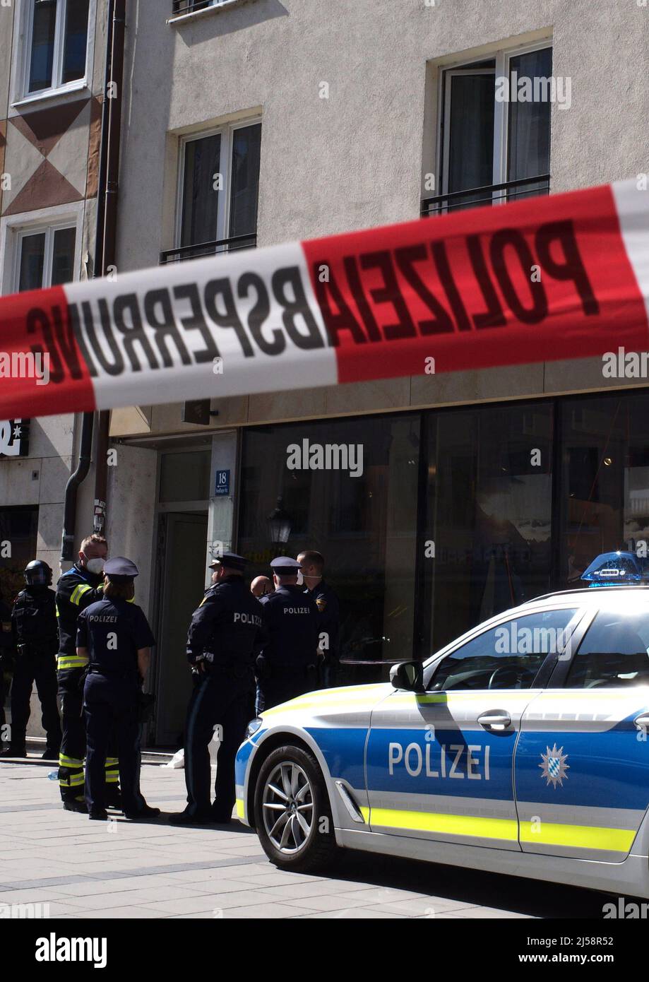 Munich, Germany. 21st Apr, 2022. Police officers stand outside a ...