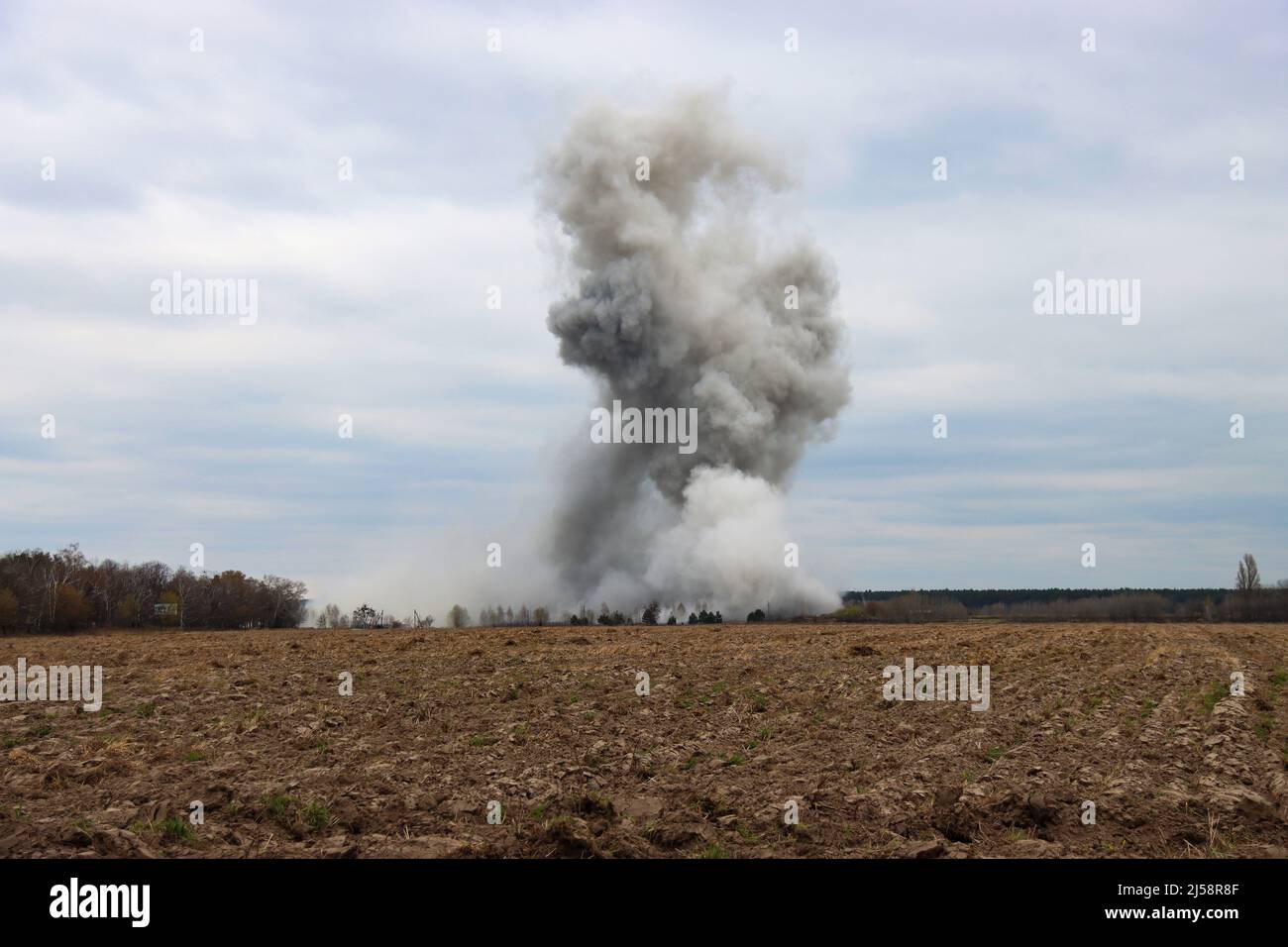 KYIV REGION, UKRAINE - APRIL 20, 2022 - Smoke rises over the site of ...