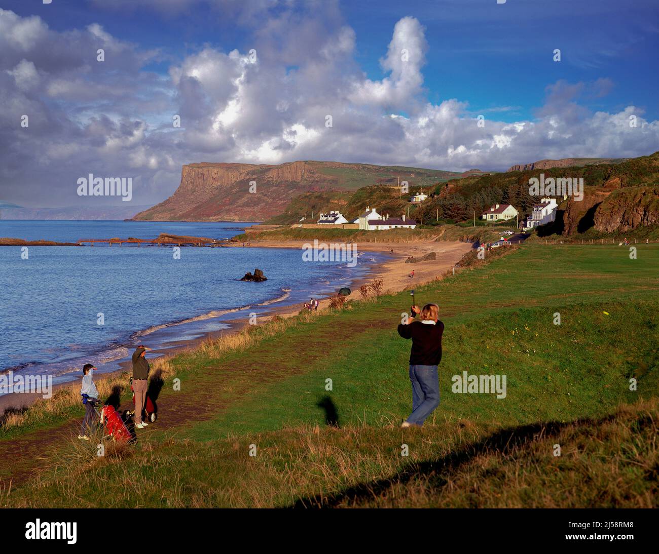 Golf at Ballycastle, with Fair Head in the background, County Antrim ...