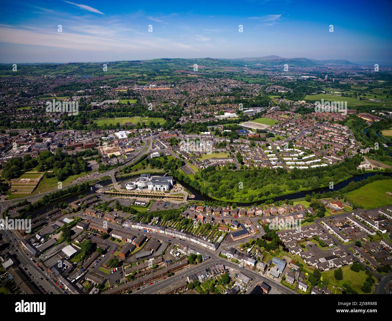 Aerial of Lisburn City with the Island Arts Centre on the River Lagan ...