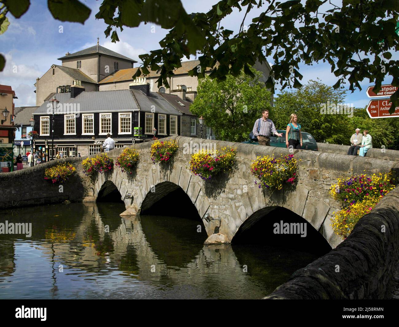 A bridge over the Carrowbeg river in Westport, County Mayo, Ireland ...