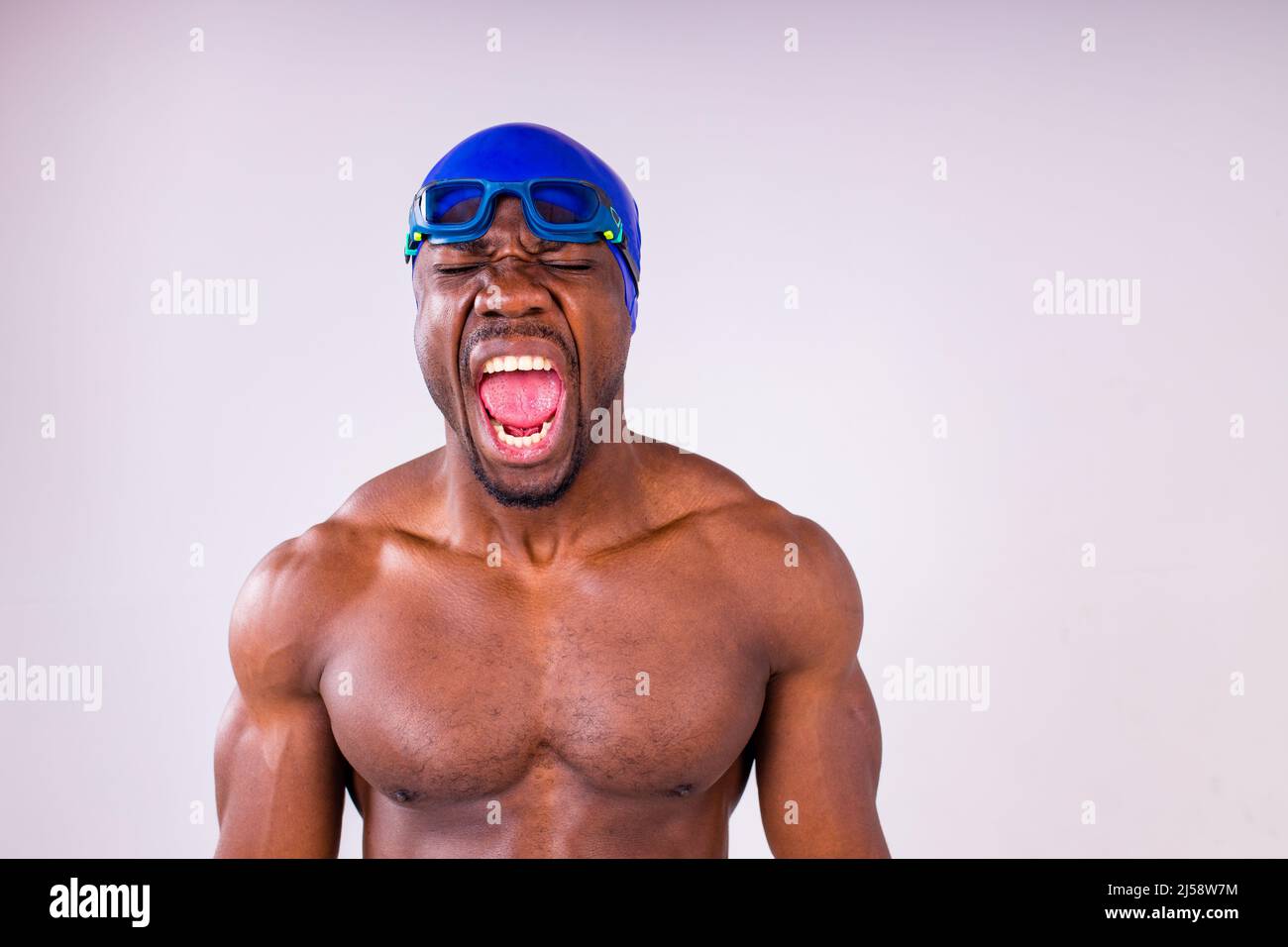 afro latin mixed race man swimmer getting ready to start swimming ...