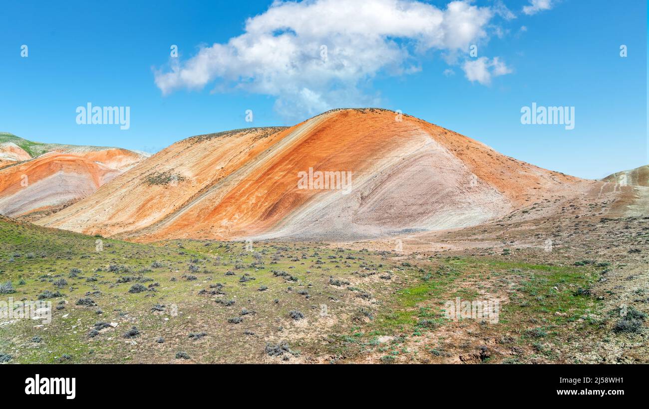 Red sand mountains in the desert area Stock Photo - Alamy