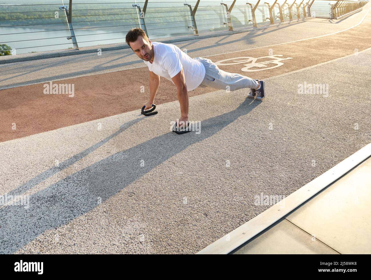 Full length portrait of a handsome middle aged Caucasian man, muscular ...
