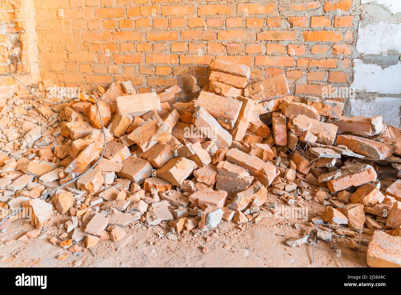 Construction debris from a dismantled brick wall. Construction industry ...