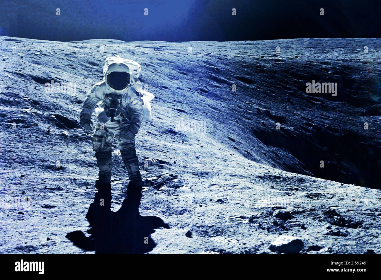The astronaut goes across the Moon, in a white space suit Elements of ...
