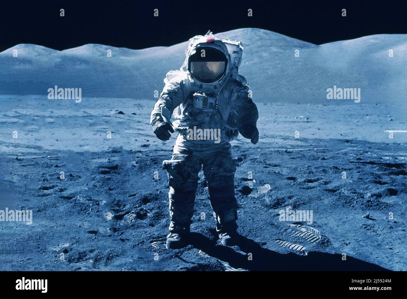 The astronaut goes across the Moon, in a white space suit Elements of ...