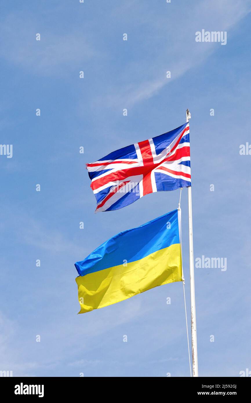 Union jack flag and ukrainian flag together hi-res stock photography ...